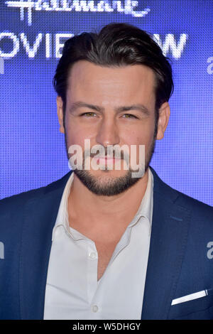 Tyler Hynes at the Hallmark Channel Summer TCA 2019 event in a private ...