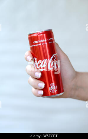 hand holds cola with ice in glass isolated on white background Stock ...