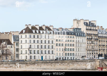 Elegant Haussmann apartment buildings with balconies and iron railings ...