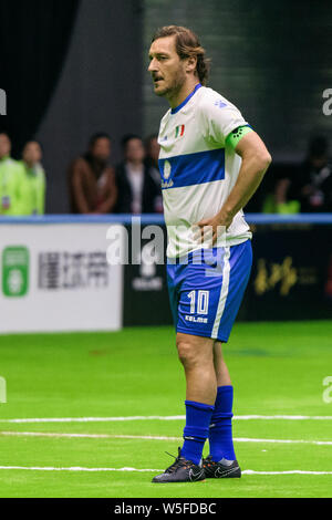Italian football star Francesco Totti takes part in the China game of ...