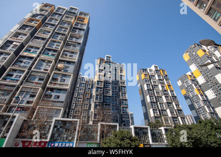 The residential building featuring shape of pile-up of blocks is seen ...