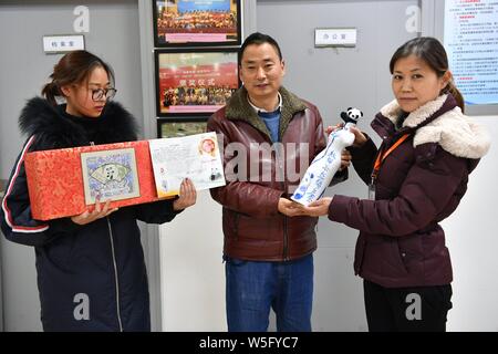 The Cheongsam-shaped porcelain and panda poo tea are donated by An ...