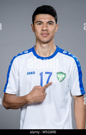 Portrait of Dostonbek Khamdamov of Uzbekistan national football team ...