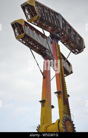 Double Pendulum Kamikaze Amusement Park Thrill Ride in Hall Stock Photo ...