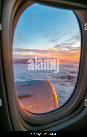 Generic view from airplane window of sunrise over England, United ...