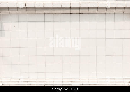 Dirty white ceramic tile wall texture background Stock Photo - Alamy