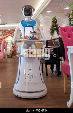 Theresa the robotic waitress at The Tea Terrace's Cobham branch in ...