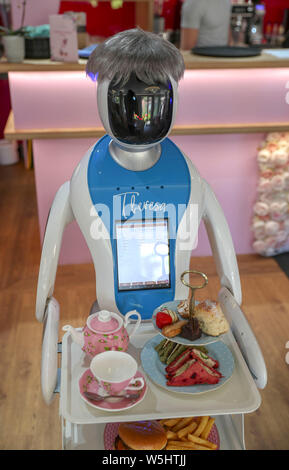 Theresa the robotic waitress at The Tea Terrace's Cobham branch in ...