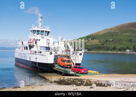 The Calmac ferry Isle of Arran leaving Oban for Coll and Tiree Stock ...