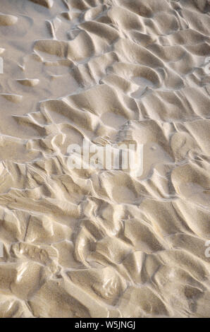 Abstract background of thin wet sand Stock Photo - Alamy