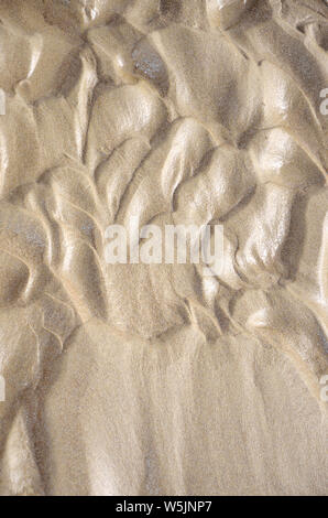 Abstract background of thin wet sand Stock Photo - Alamy