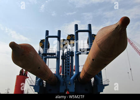 The 138-meter-long dredging vessel Xin Hai Xu is docked at a port in ...