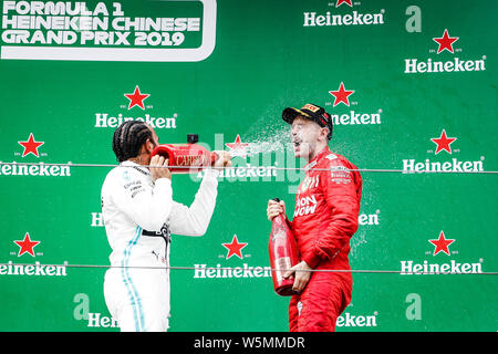 Ferrari driver Lewis Hamilton on the grid before the race at the ...