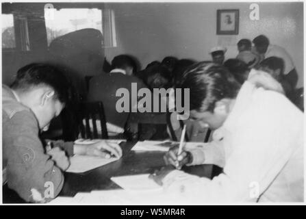 Filling out forms for enlistment in the Navy Stock Photo - Alamy