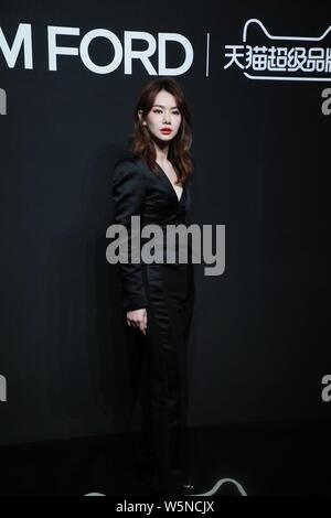 Chinese actress Stephy Qi (Qi Wei), right, and her South Korean singer ...