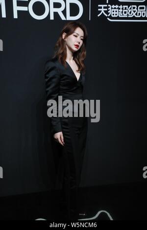 Chinese actress Stephy Qi (Qi Wei), right, and her South Korean singer ...