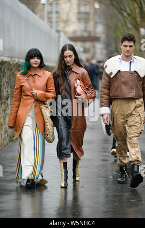 A trendy woman poses for street snaps during the Paris Fashion Week ...