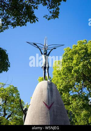 A statue of "genbaku no ko no zo", literally "Statue of the Children of ...