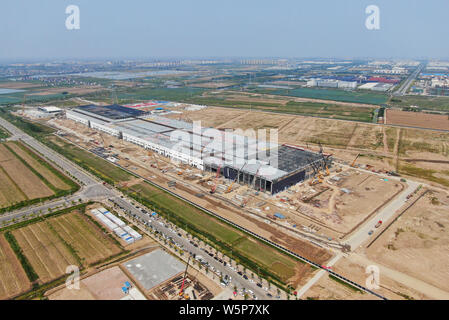 An aerial view of the Tesla Gigafactory 3 under construction in Lingang ...