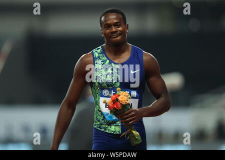 Aaron Brown celebrates after winning the 100m final at the 2018 ...