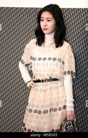 Chinese singer Zhang Bichen or Diamond Zhang attends an opening ...