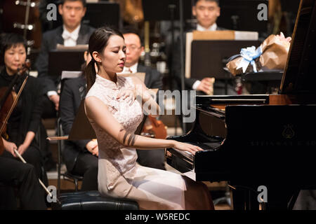 --FILE--Gina Alice Redlinger, the wife of Chinese pianist Lang Lang ...