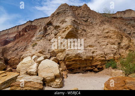 Yellow sandy rocks and stones of various forms on the Black Sea coast ...