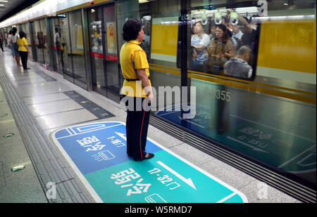 A logo shows strong and weak cold area on the Subway Line 2 in Beijing ...