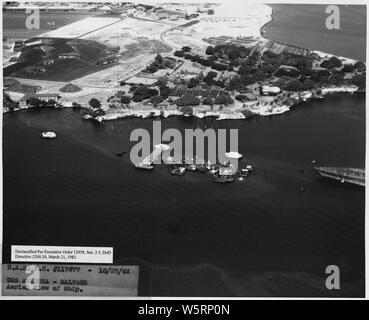 An aerial view of the US Naval Ship Repair Facility. Berthed at the ...