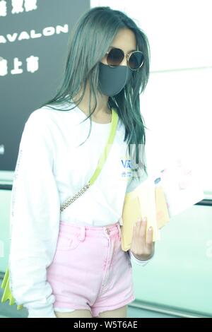 Chinese actress and singer Yang Chaoyue attends an activity in Beijing ...