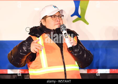 Chinese singer Han Hong attends the PEACEBIRD 30th anniversary fashion ...