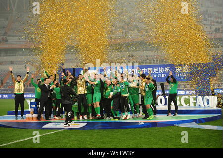 Players of China's Beijing Sinobo Guoan take part in a training session ...