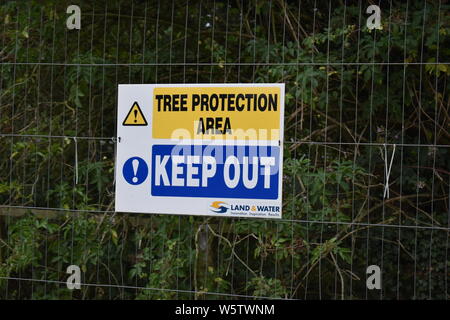 "Keep Out" sign on fencing on a building site, East Sussex Stock Photo ...