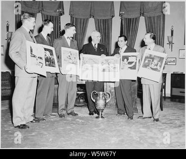 Photograph of President Truman posing in the White House Rose Garden ...