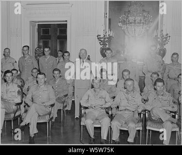Photograph of President Truman posing in the White House Rose Garden ...