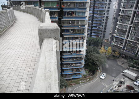 A 40-meter-high pedestrian overpass supported by one concrete column ...