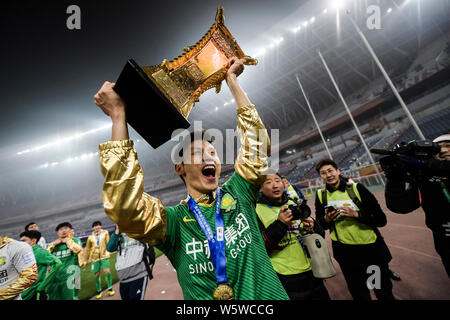 Players of Beijing Sinobo Guoan celebrate after scoring against ...