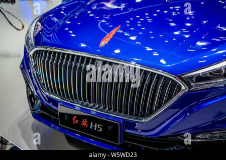 A Hongqi (Red Flag) H5 sedan of China FAW Group Corp. is on display ...