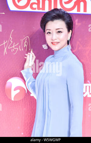 Chinese businesswoman and TV hostess Yang Lan poses as she arrives at ...