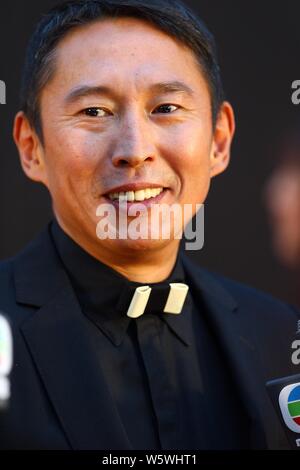 Taiwanese director Doze Niu and Chinese actress Ni Ni pose during an ...