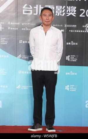 Taiwanese director Doze Niu and Chinese actress Ni Ni pose during an ...