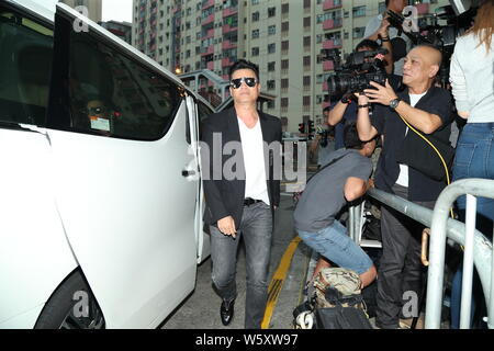 Hong Kong actor Ray Lui Leung-wai, right, poses with his wife on the ...