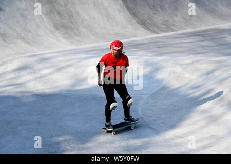 Sakura Yosozumi of Japan competes in the quarter finals of the women's ...