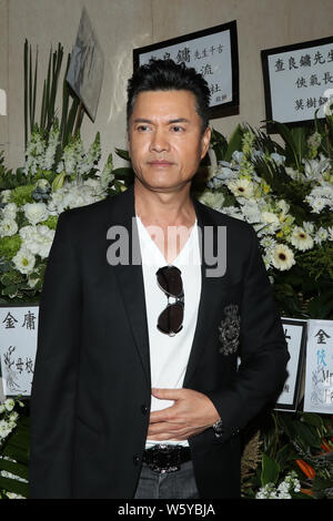 Hong Kong actor Ray Lui, right, poses with his wife Yang Xiaojuan ...