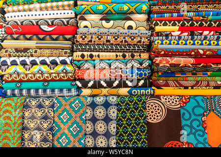 Plenty of colorful african fabrics on local open air market, Maputo ...