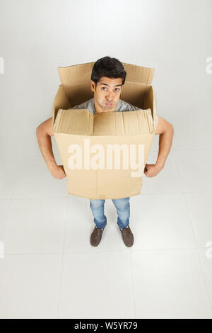 Portrait of a man puffing out his cheeks Stock Photo - Alamy