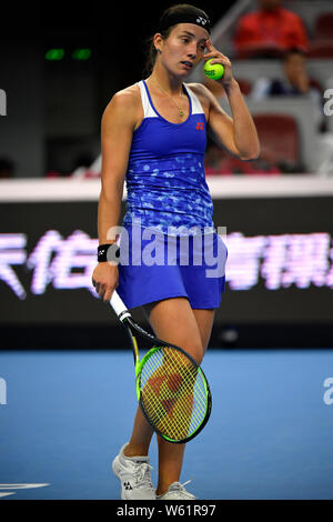 Anastasija Sevastova of Latvia reacts as she competes against Caroline ...