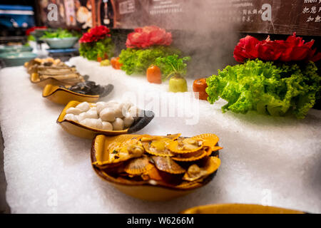 Delicious asian japanese style starter cold snacks sushi buffet table ...