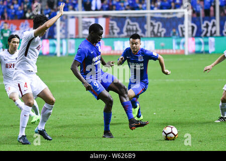 Senegalese football player Demba Ba, left, of Shanghai Greenland ...
