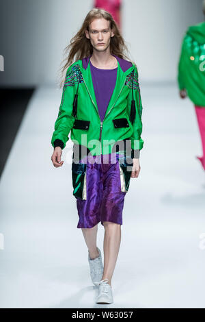 A model displays a new creation at the CHRISTOPHE TERZIAN X Nn fashion ...